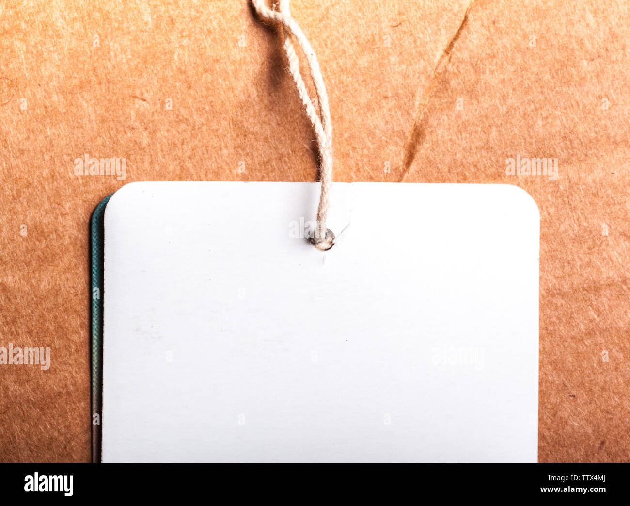 price tag label on wooden background Stock Photo - Alamy