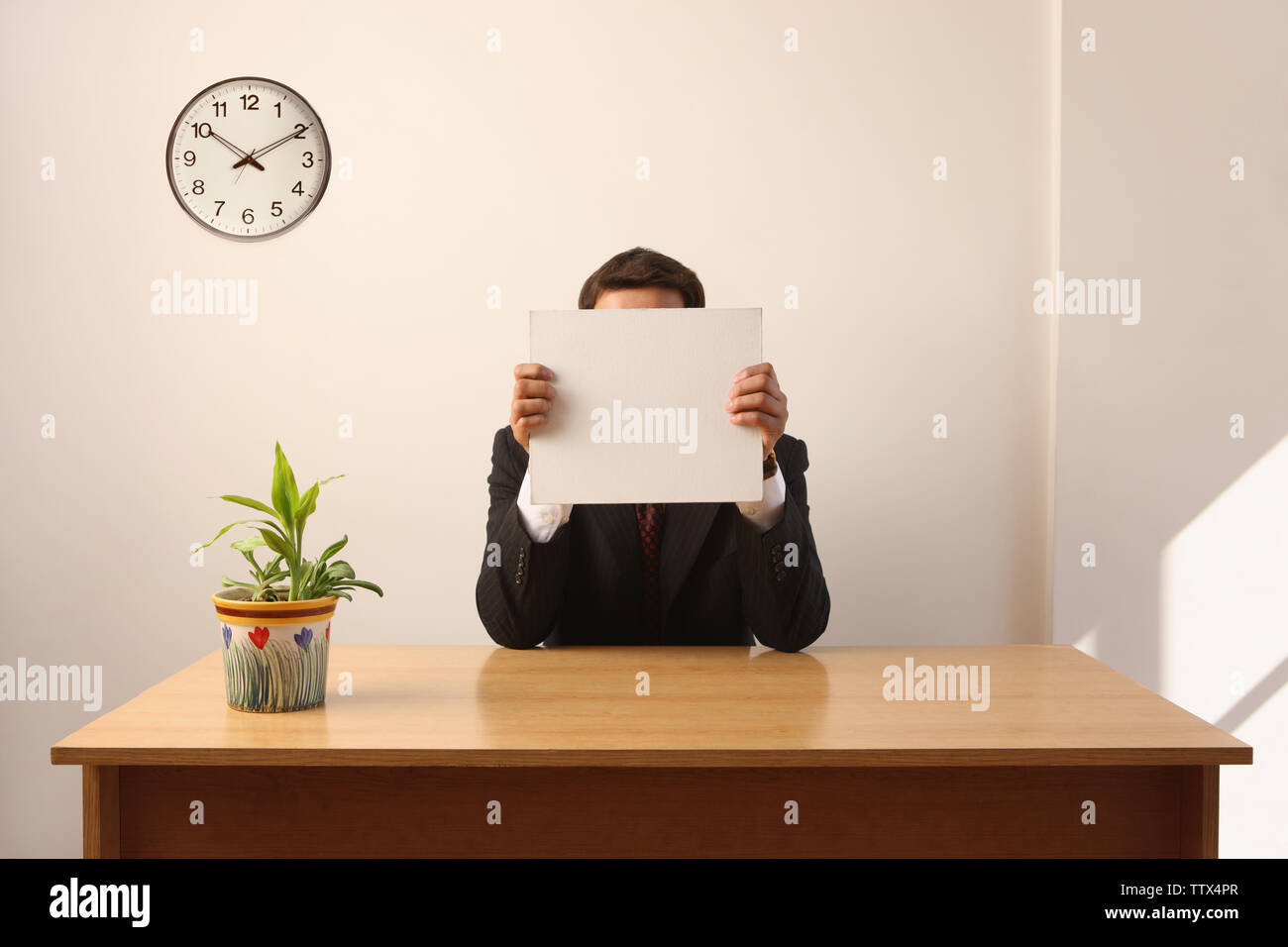 Placard obscured face hi-res stock photography and images - Alamy