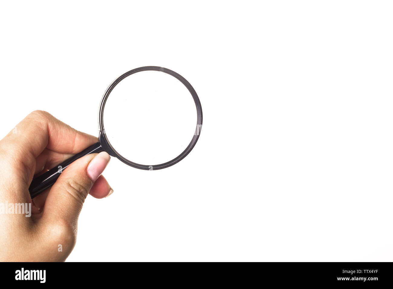 Hand holding magnifying glass isolated on white background Stock Photo ...