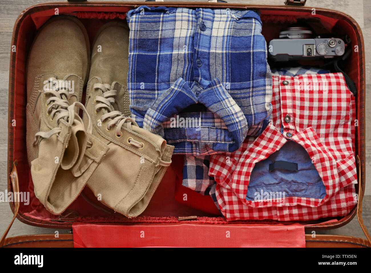 Open suitcase packed hi-res stock photography and images - Alamy