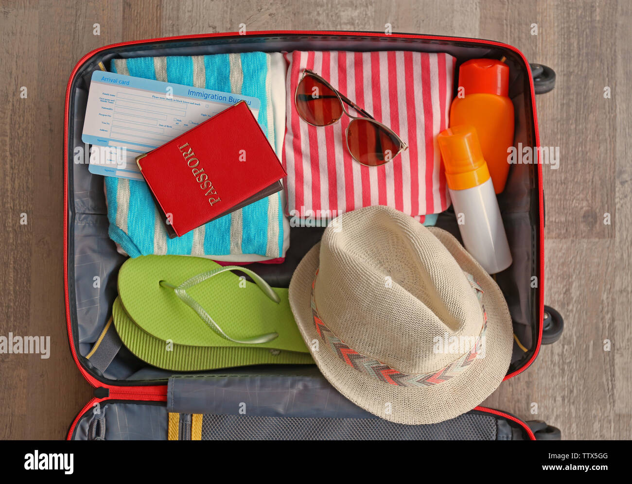 Open suitcase packed hi-res stock photography and images - Alamy