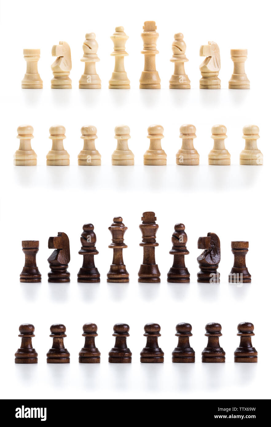wooden chess set lined up in rows isolated Stock Photo - Alamy