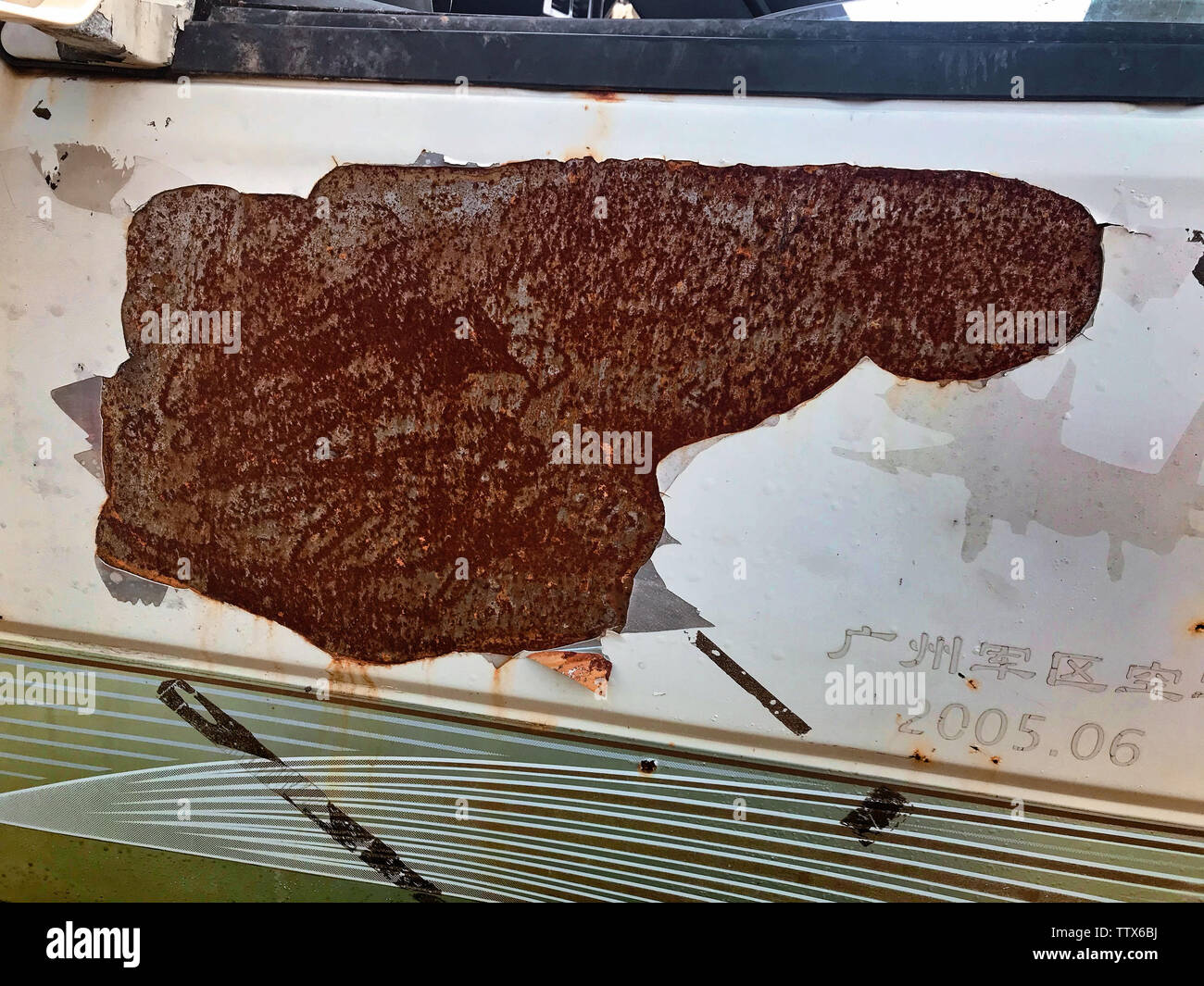 The rust and damage on the wreckage of the car Stock Photo - Alamy