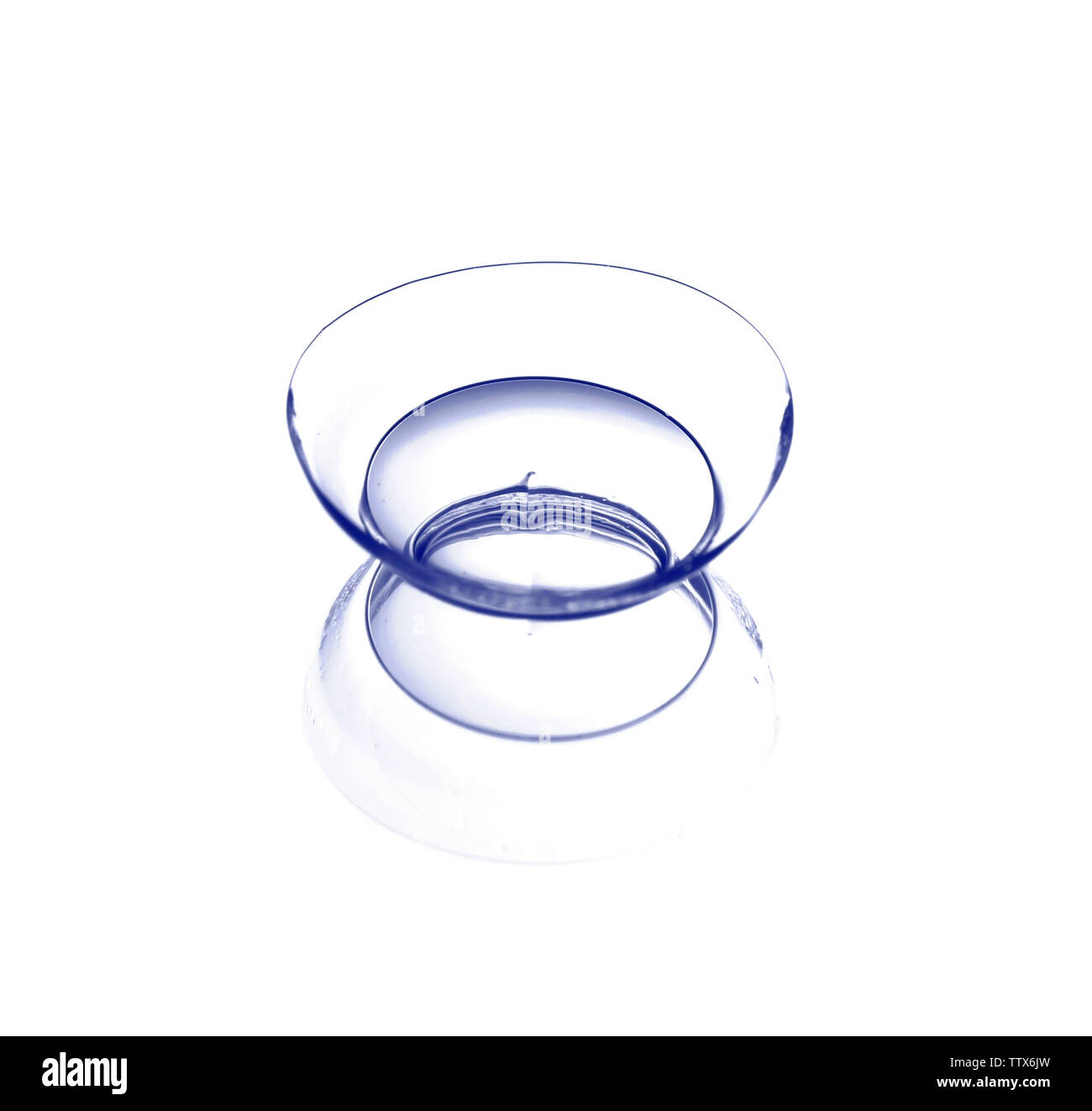 Contact lens on smooth light background, close up view. Medicine and ...