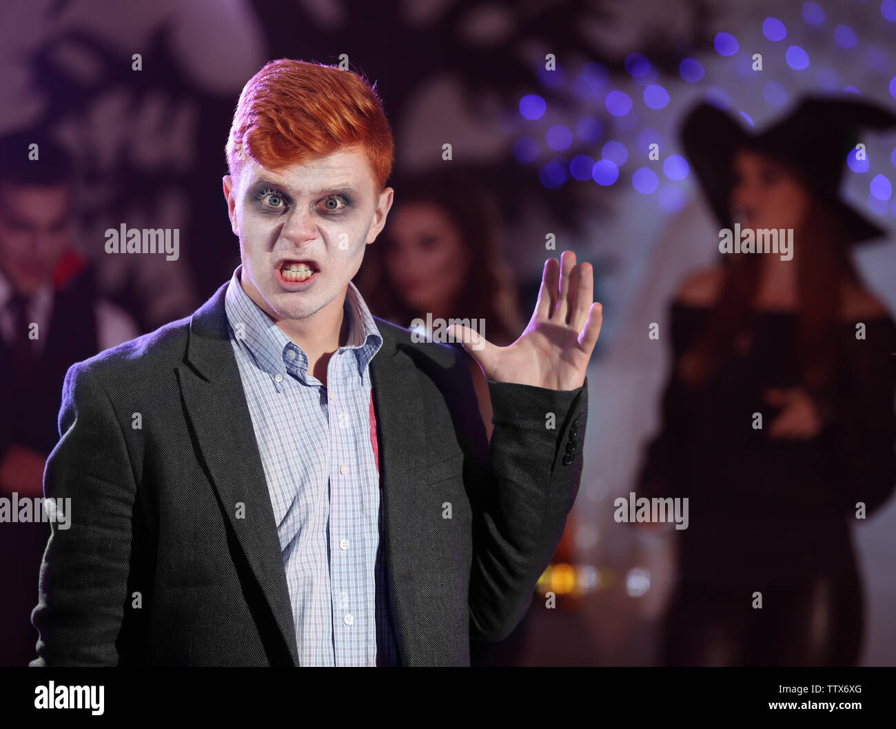 Guy dressed as dead man at Halloween party Stock Photo - Alamy