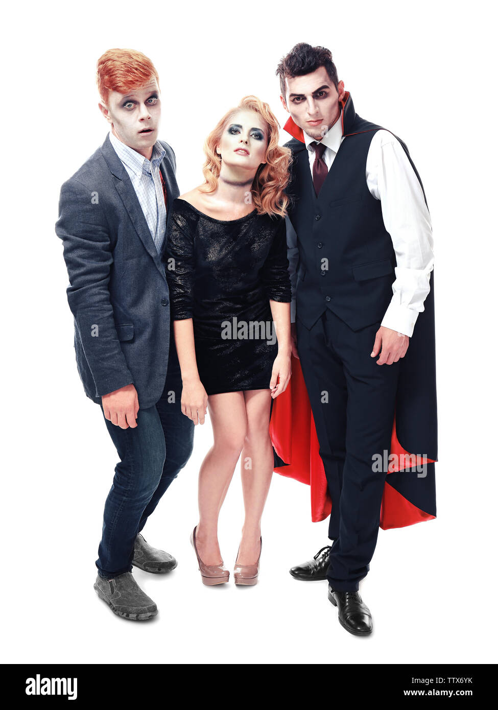 Young people dressed in different costumes for Halloween, isolated on ...