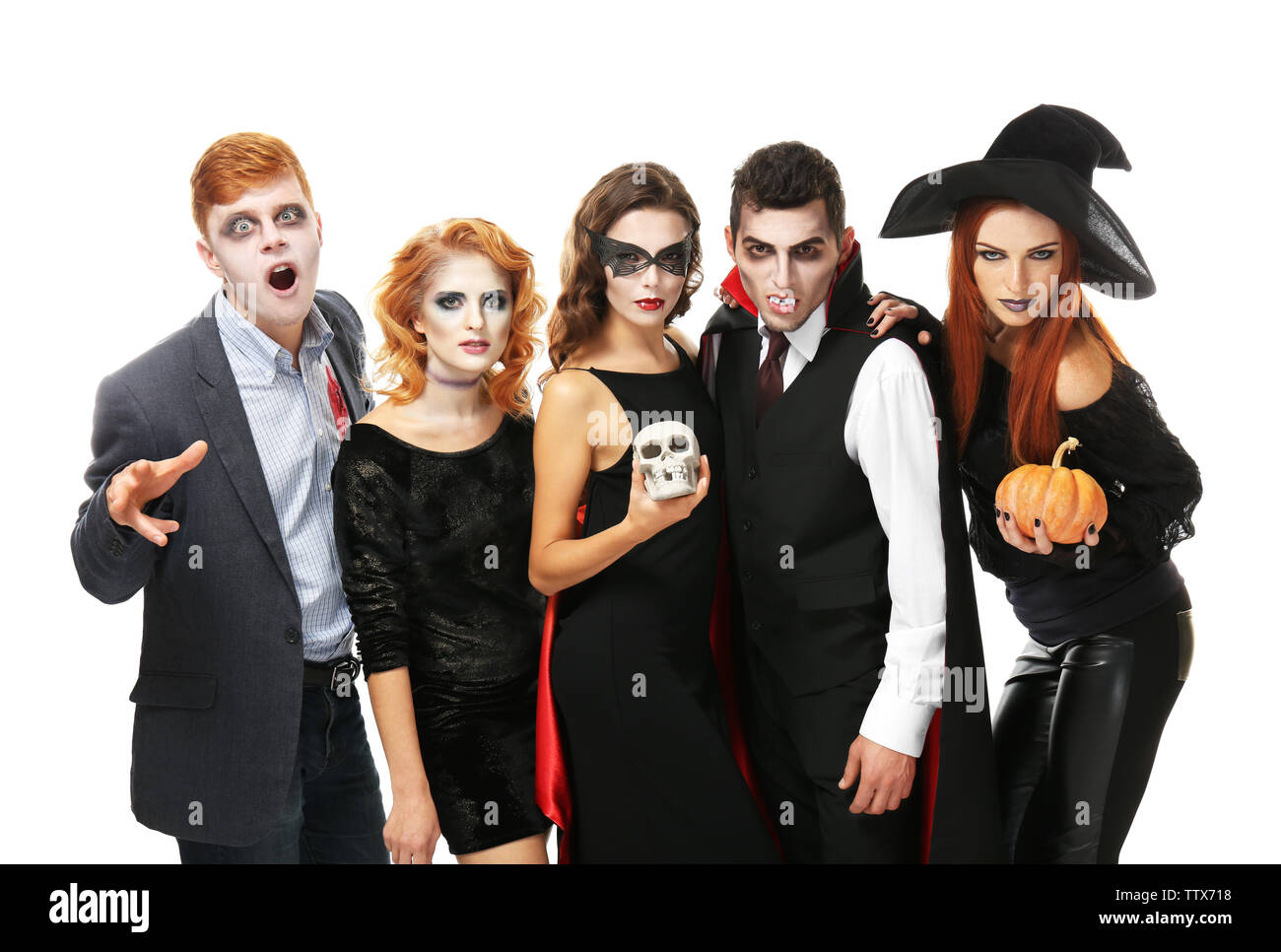 Young people dressed in different costumes for Halloween, isolated on ...