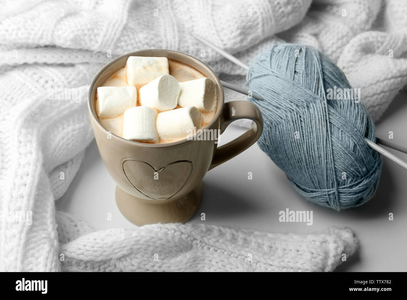 Hot drink with marshmallows on table Stock Photo - Alamy