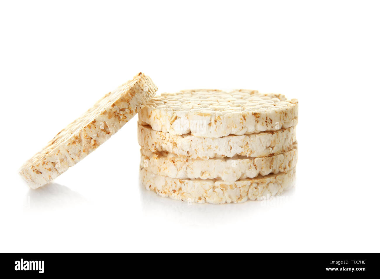 Round rice crispbreads on white background Stock Photo - Alamy