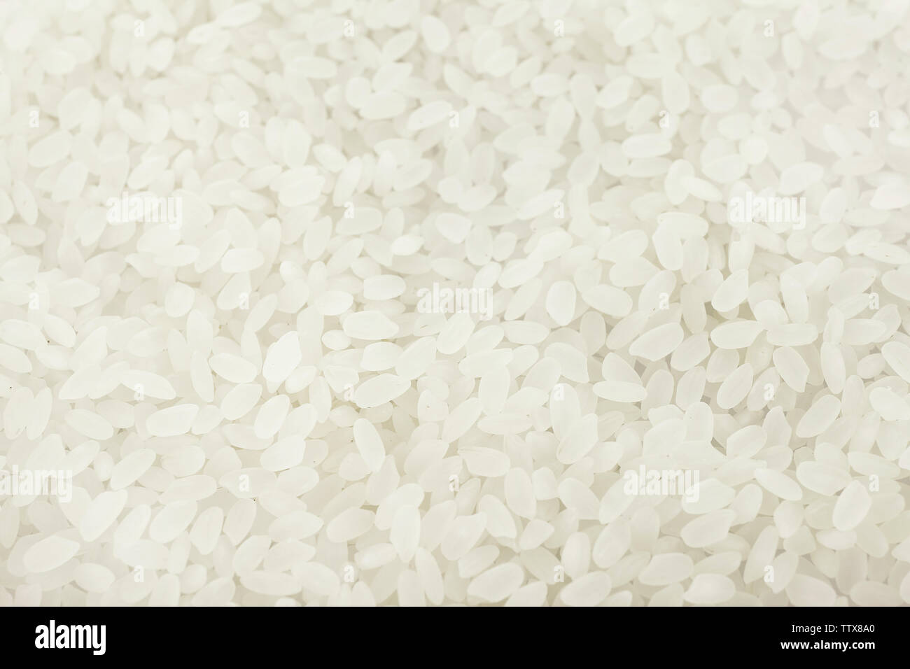 White rice background Stock Photo - Alamy