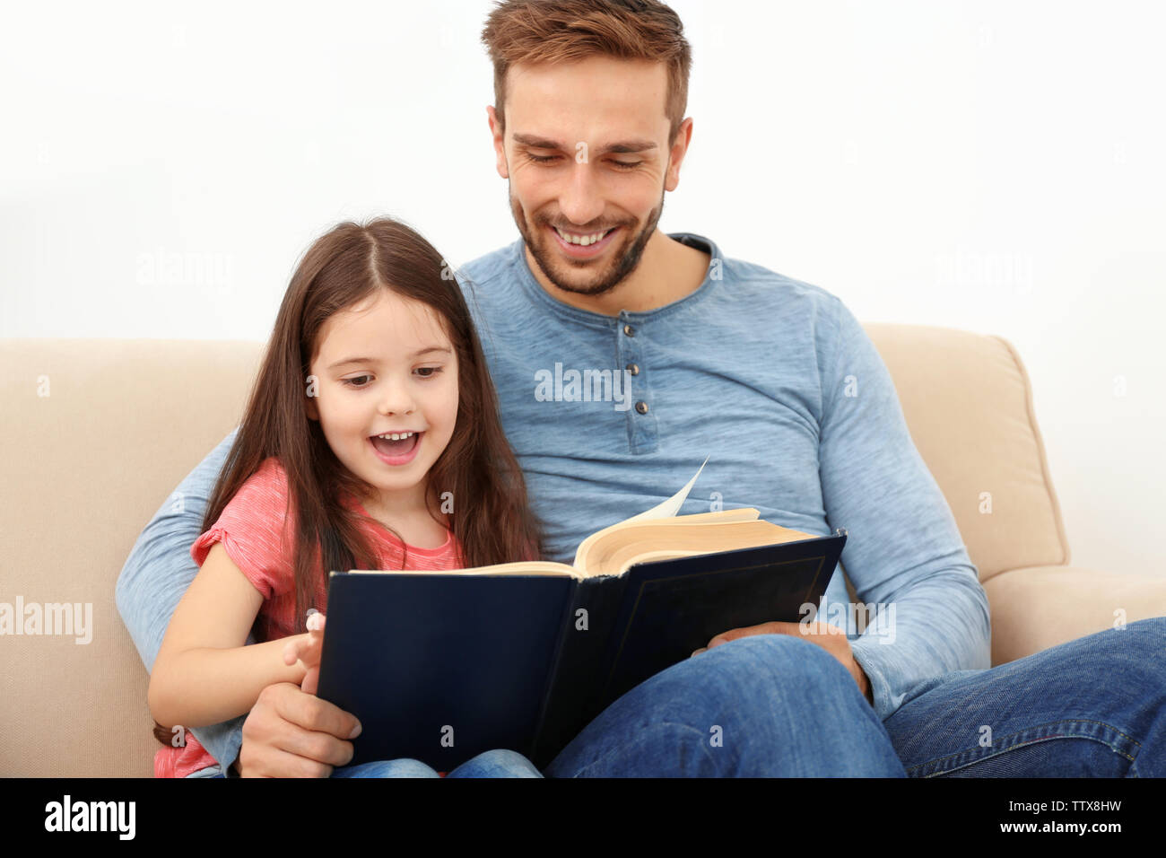 Father daughter enjoying reading hi-res stock photography and images ...