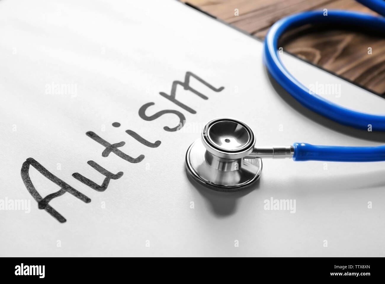 Word AUTISM and stethoscope on paper, closeup Stock Photo - Alamy