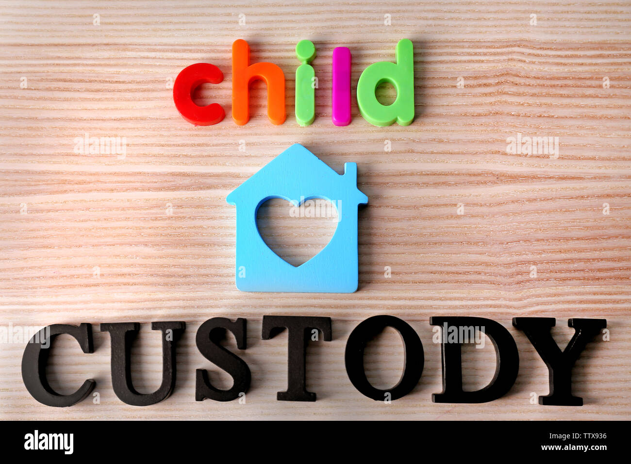 Words CHILD CUSTODY on wooden background, top view Stock Photo - Alamy