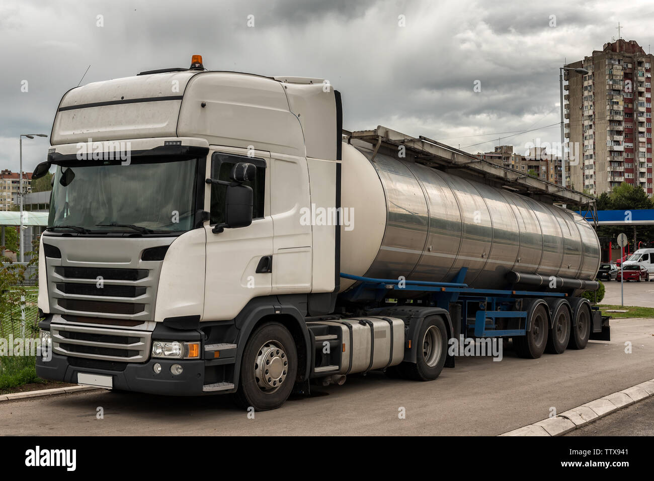 Tank truck parked on by the road in the city, near gas station Stock ...