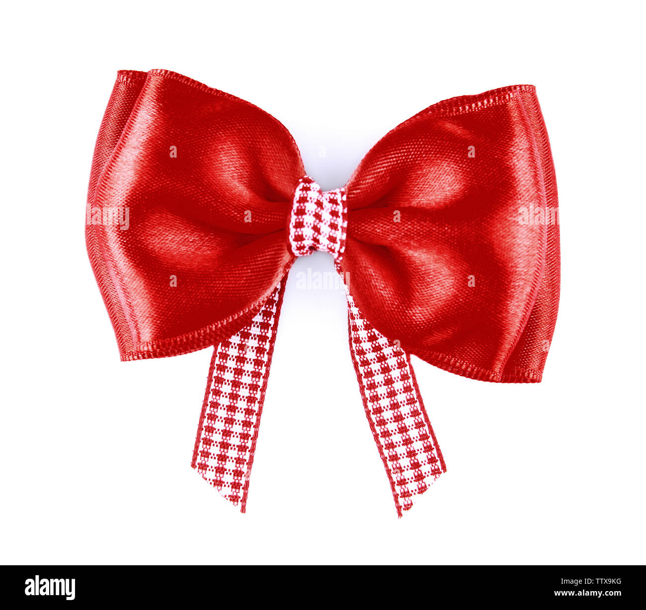 Festive red bow on white background Stock Photo - Alamy