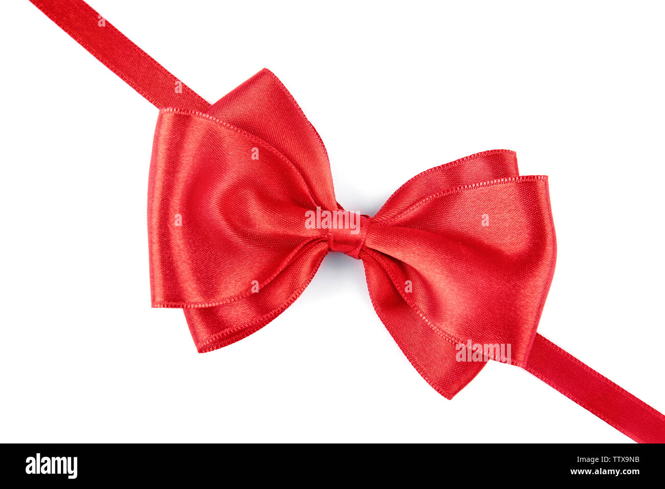 Red ribbon with bow isolated on white Stock Photo - Alamy