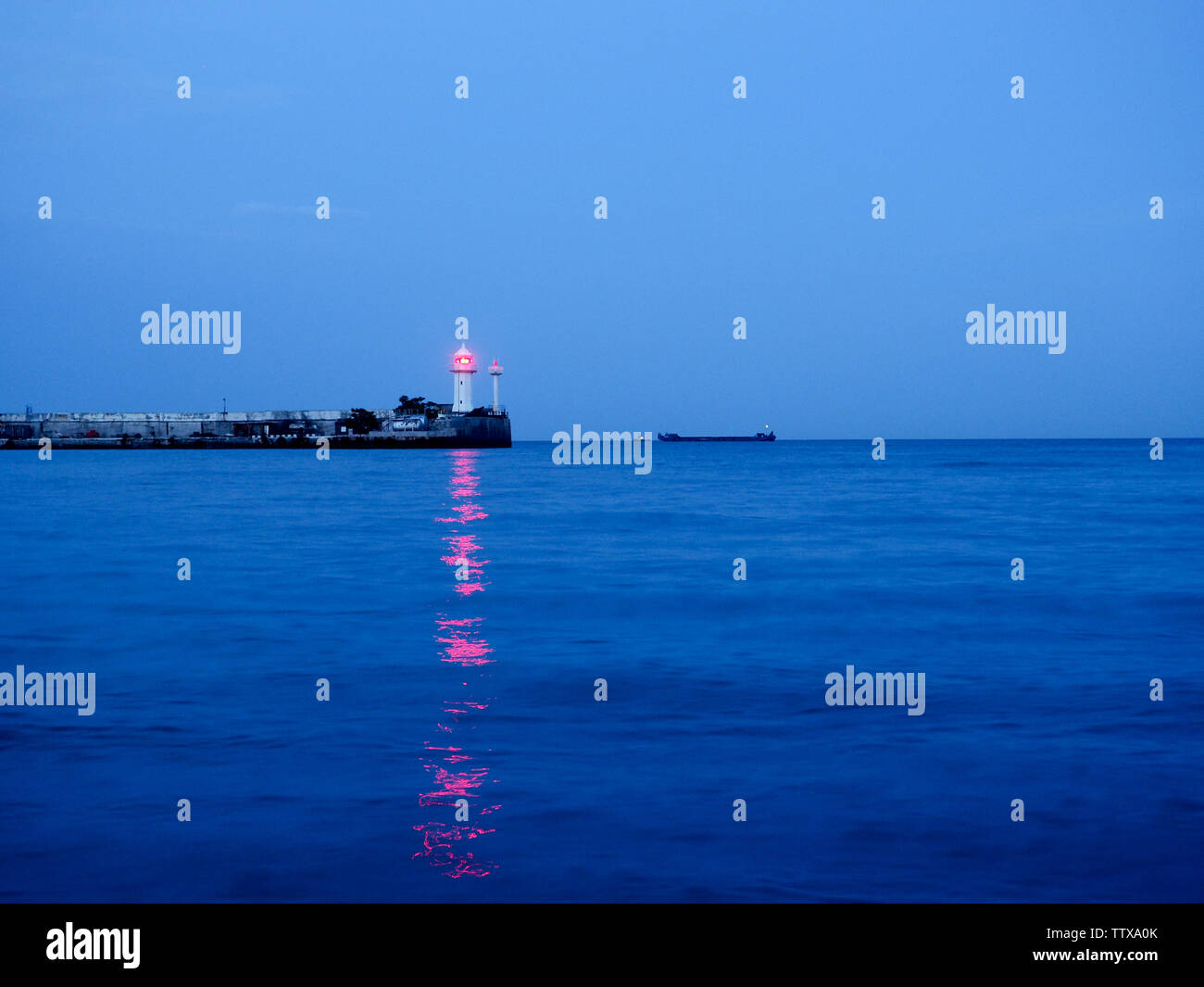 lighthouse at sunset in the twilight in clear weather in Crimea Stock ...