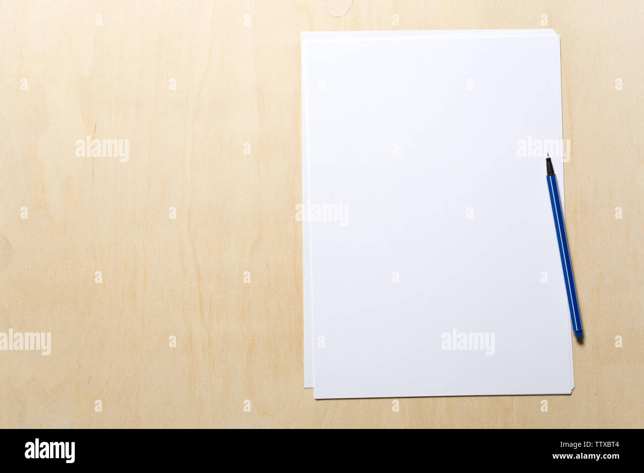 White business card on wooden table. Blank portrait A4 Stock Photo - Alamy
