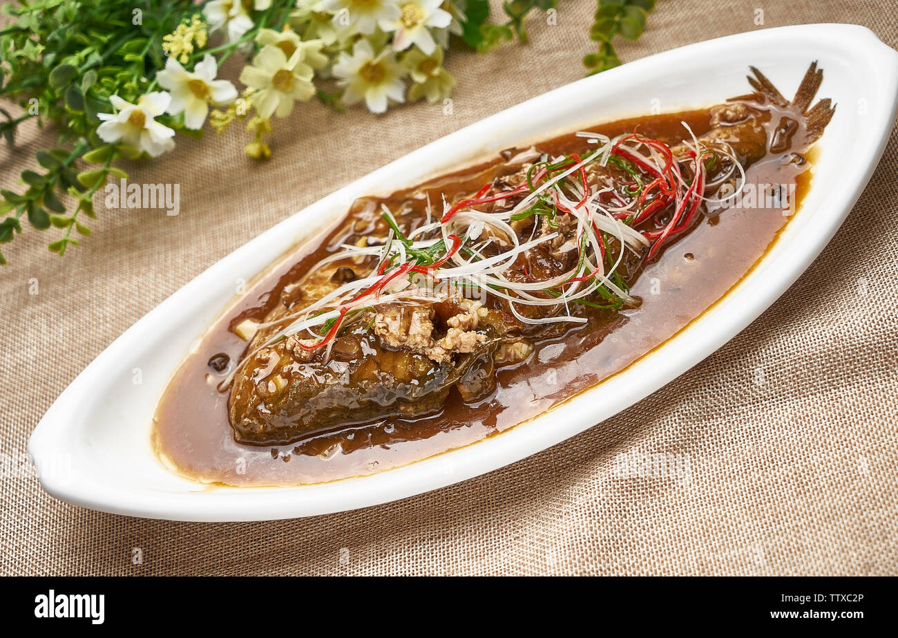 Traditional cuisine, braised yellow fish Stock Photo - Alamy