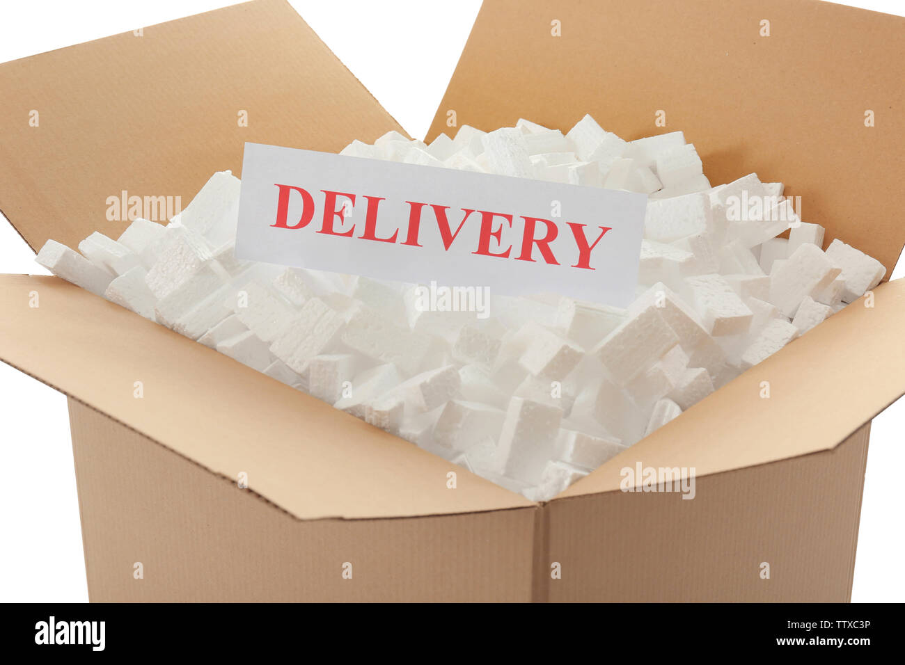 Delivery service concept. Cardboard box full of polystyrene, closeup ...