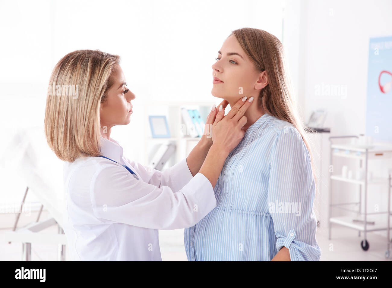 Gynecology consultation. Pregnant woman with her doctor in clinic Stock ...