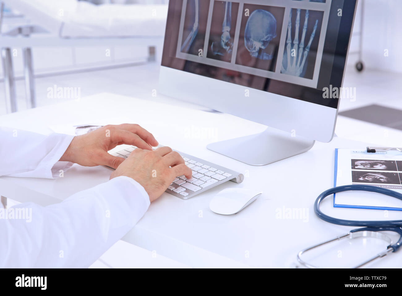 Gynecology consultation. Doctor working on computer Stock Photo - Alamy