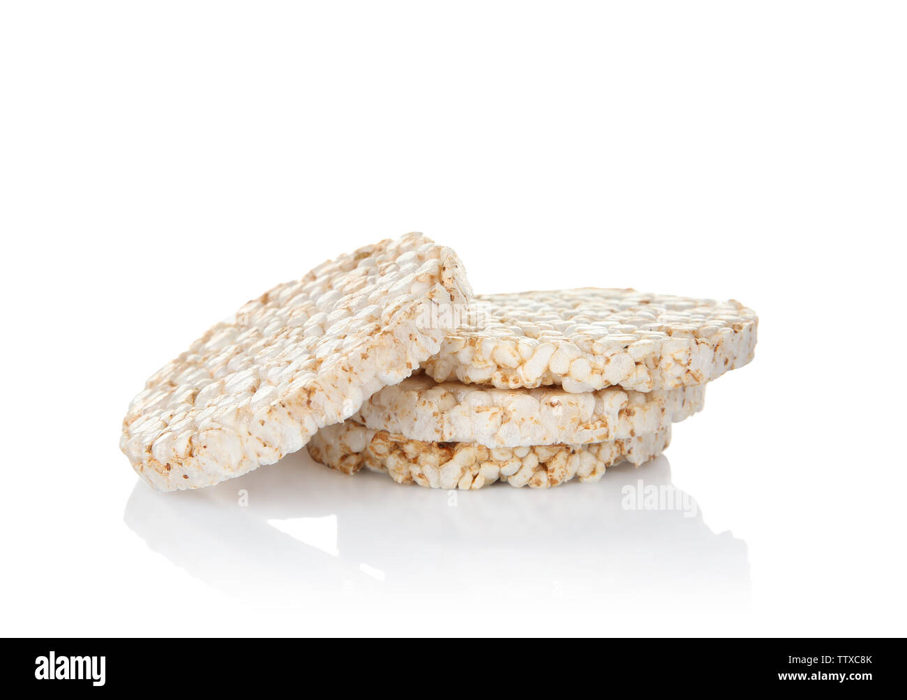 Pile of rice crackers isolated on white Stock Photo - Alamy