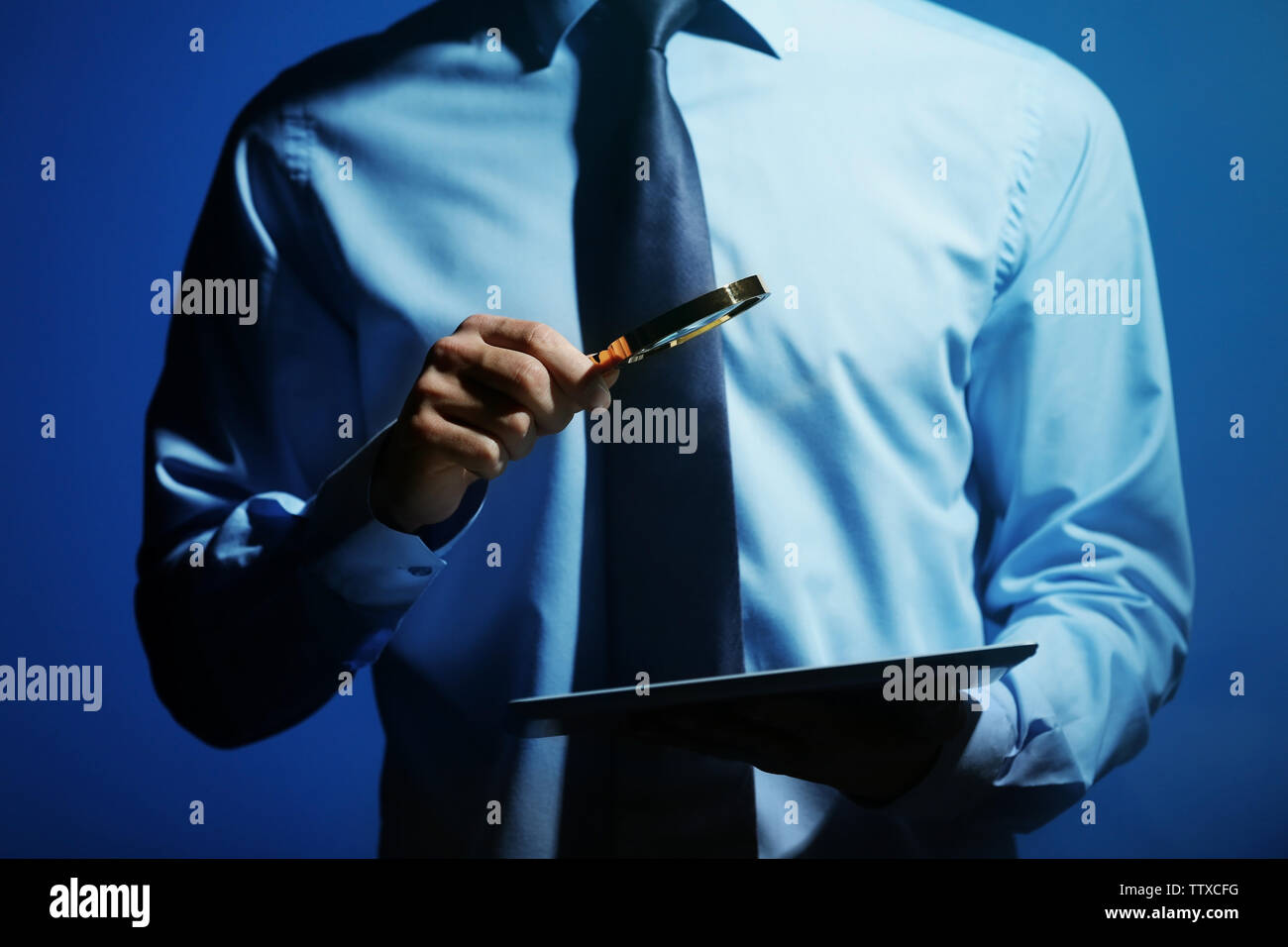 Businessman hand holding magnifier hi-res stock photography and images ...