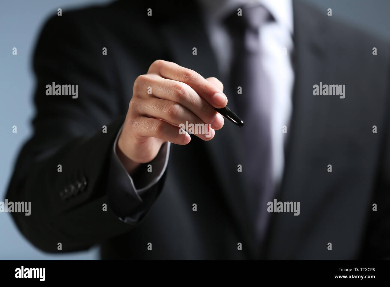 Businessman hand pointing, closeup Stock Photo - Alamy