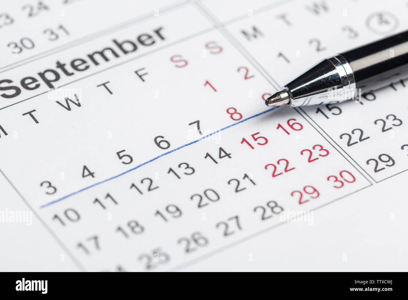 Closeup of dates on calendar page Stock Photo - Alamy