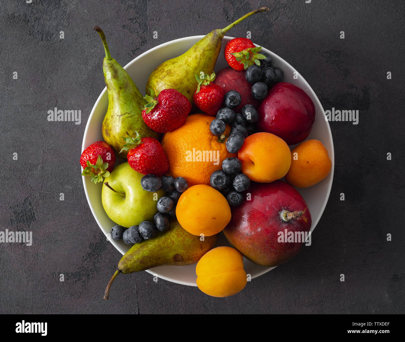 Plate different fresh fruits hi-res stock photography and images - Alamy