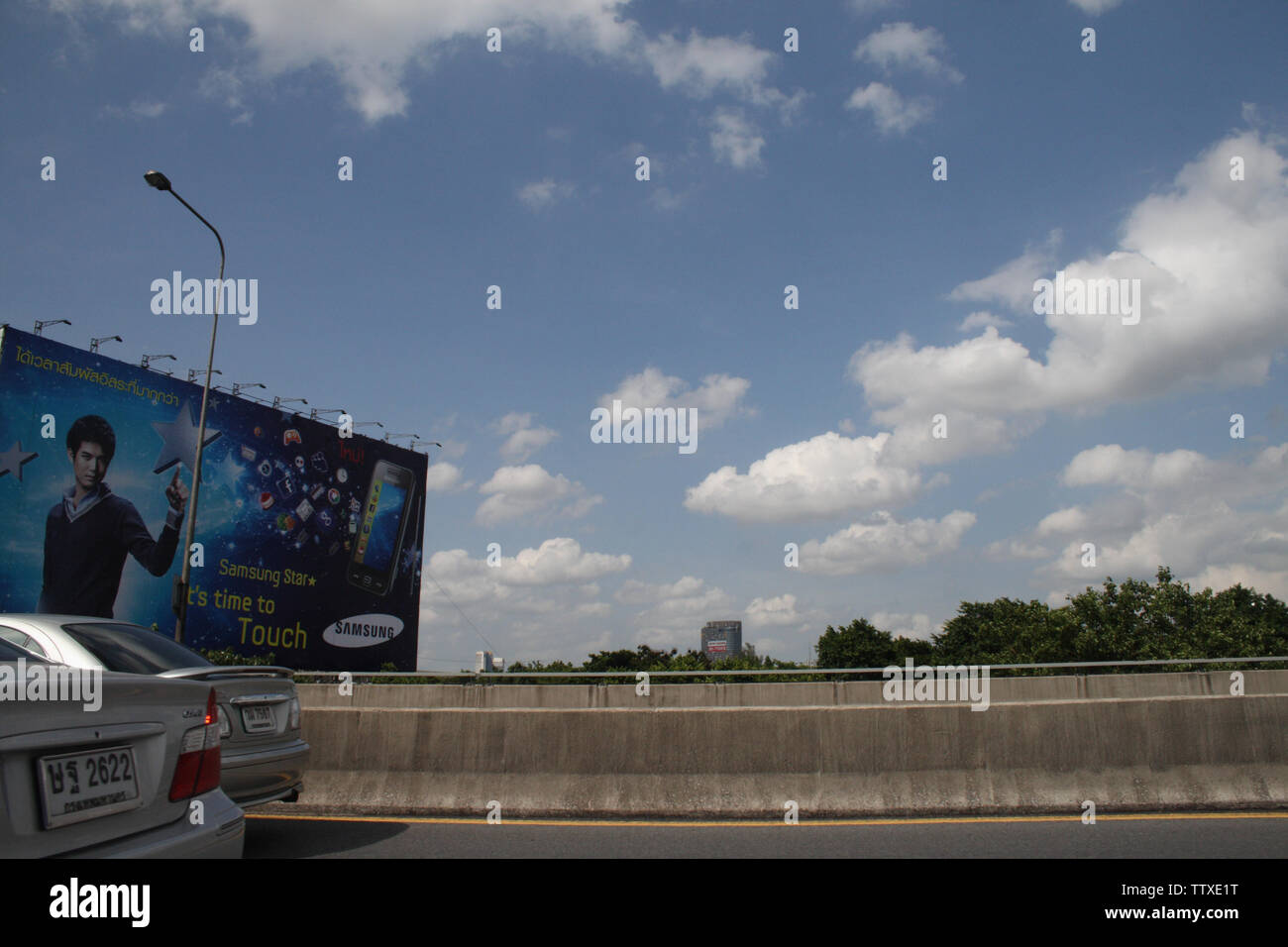 Billboard beside of an overpass, Bangkok, Thailand Stock Photo - Alamy