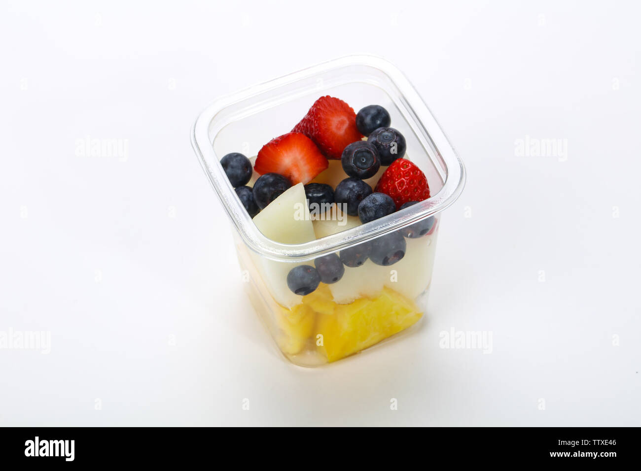 Sliced tropical fruit mix snack in the box Stock Photo - Alamy