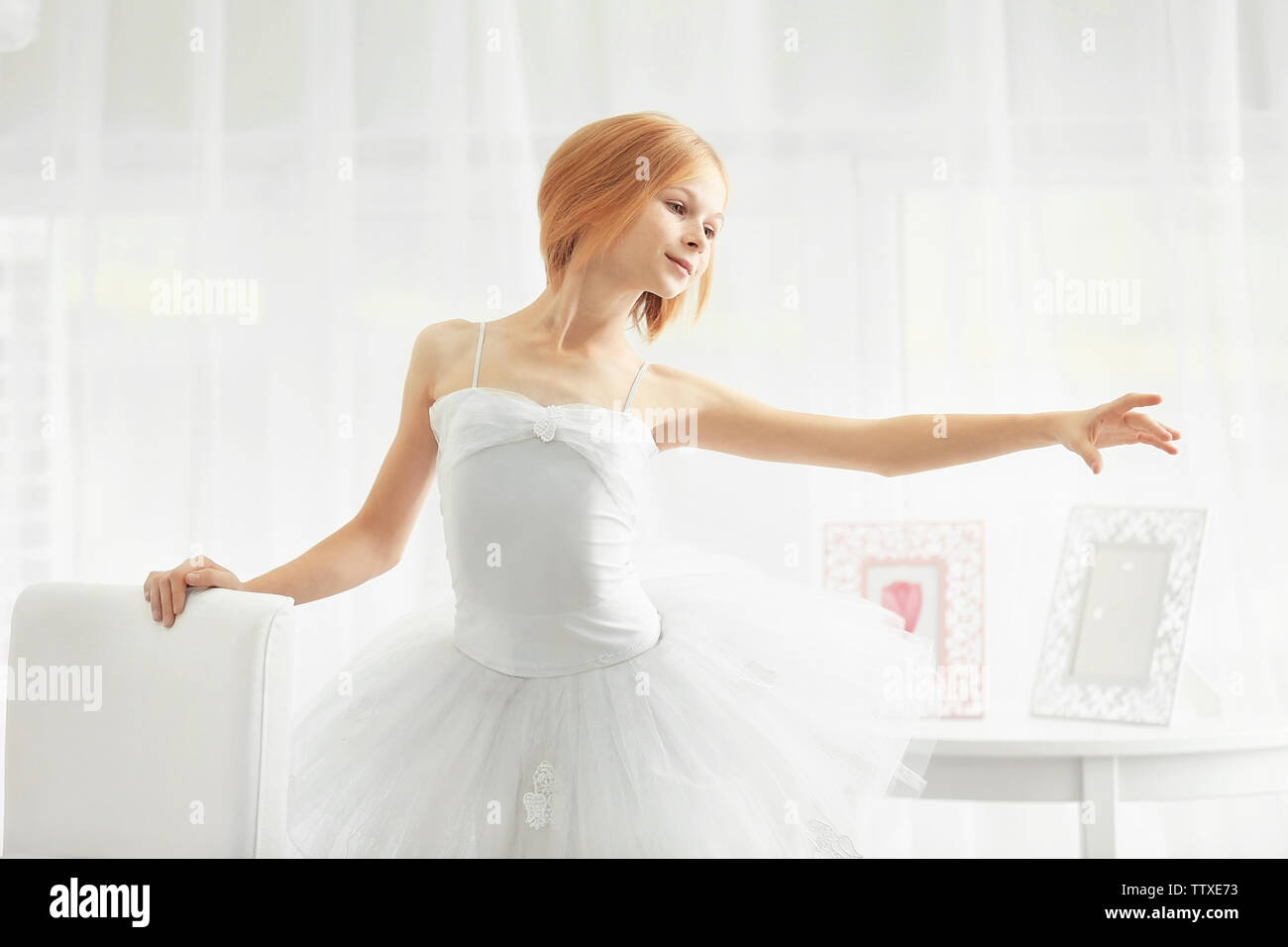 Small ballerina dancer at home Stock Photo - Alamy