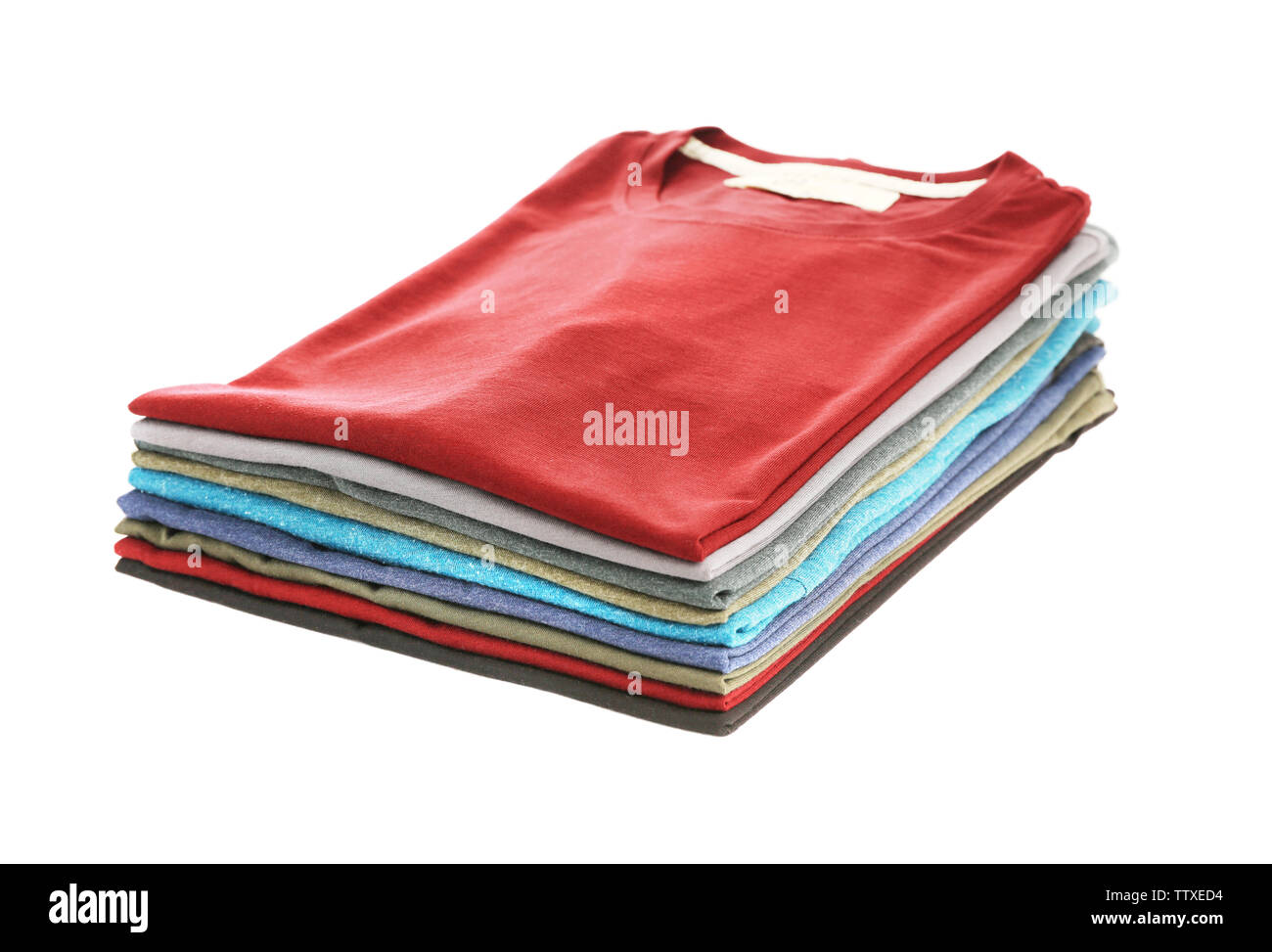 Stack of colorful t-shirts on white background Stock Photo - Alamy