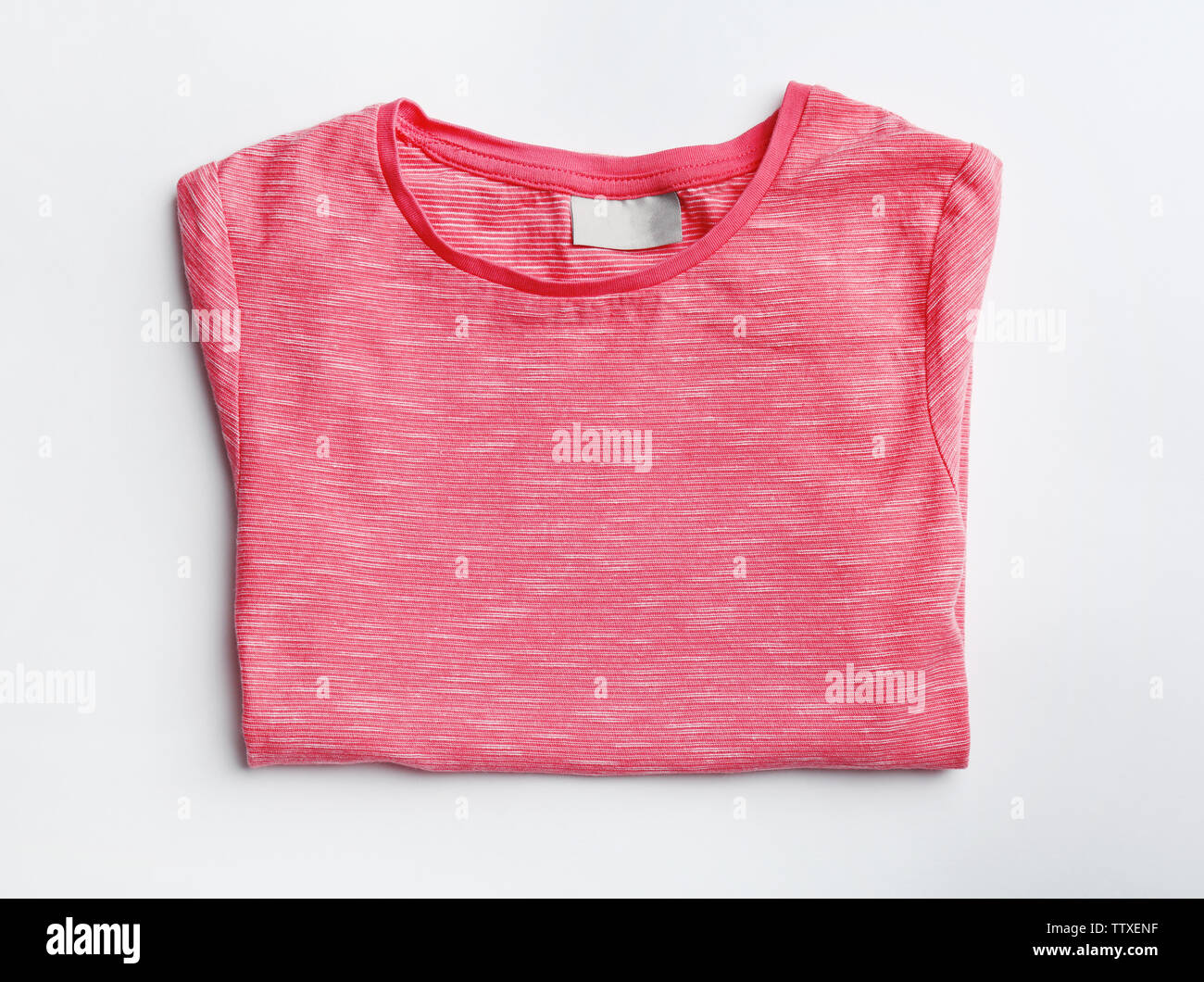 Blank color t-shirt on white background Stock Photo - Alamy