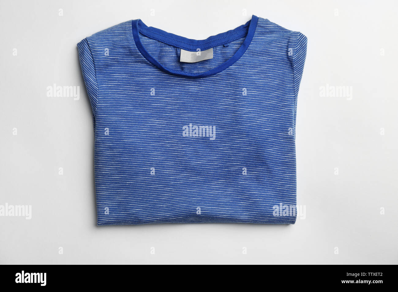 Blank color t-shirt on white background Stock Photo - Alamy