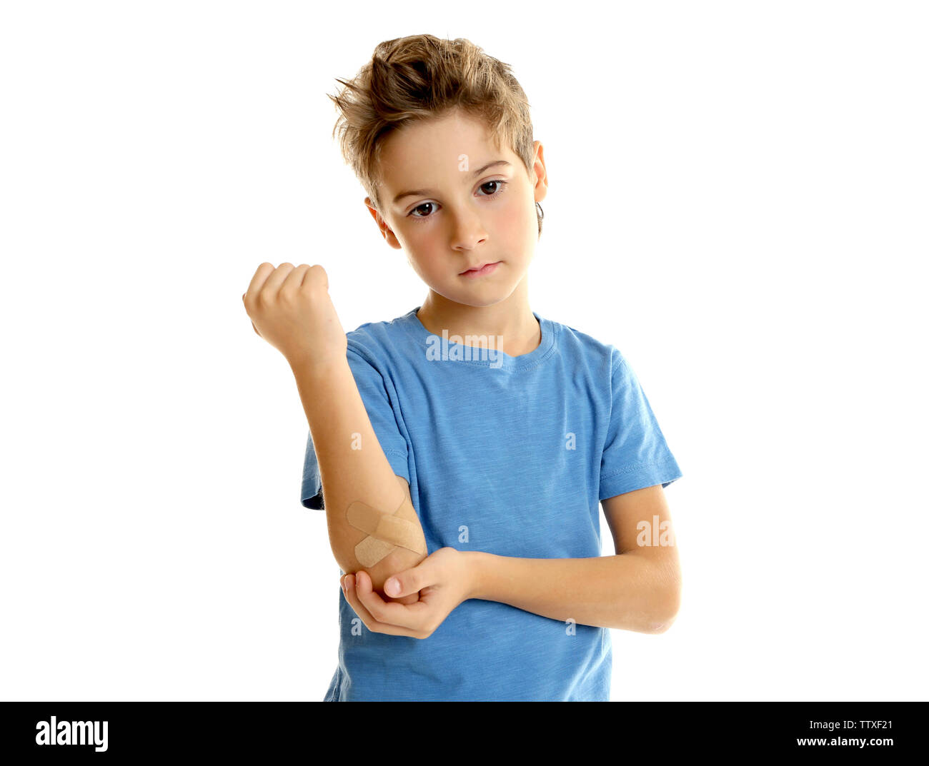 Cute little boy with sticking plaster on arm, isolated on white Stock ...