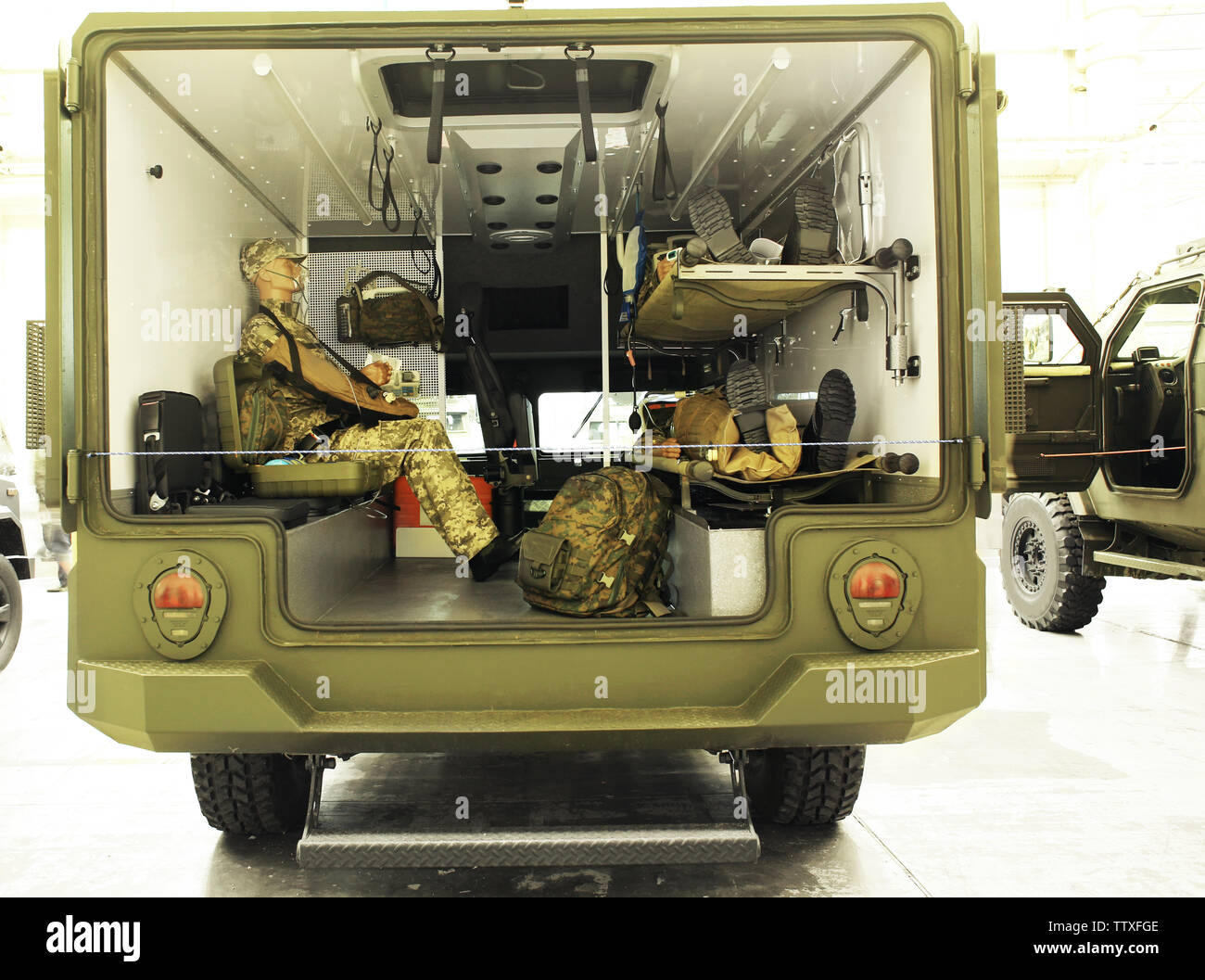 View of open military medical vehicle with mannequins inside Stock ...