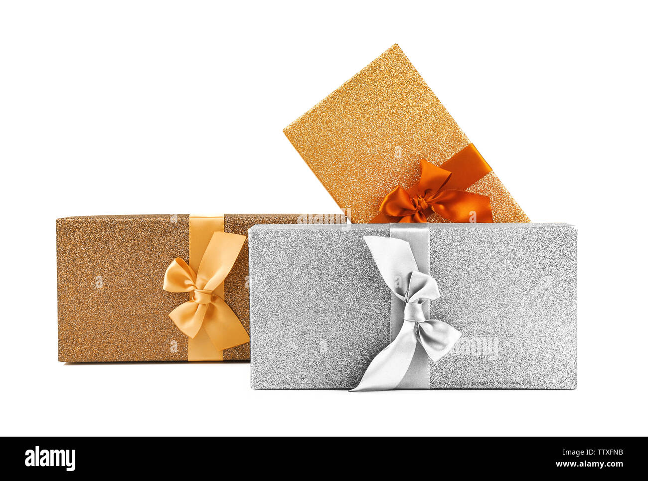Christmas gifts in shining boxes isolated on white Stock Photo - Alamy