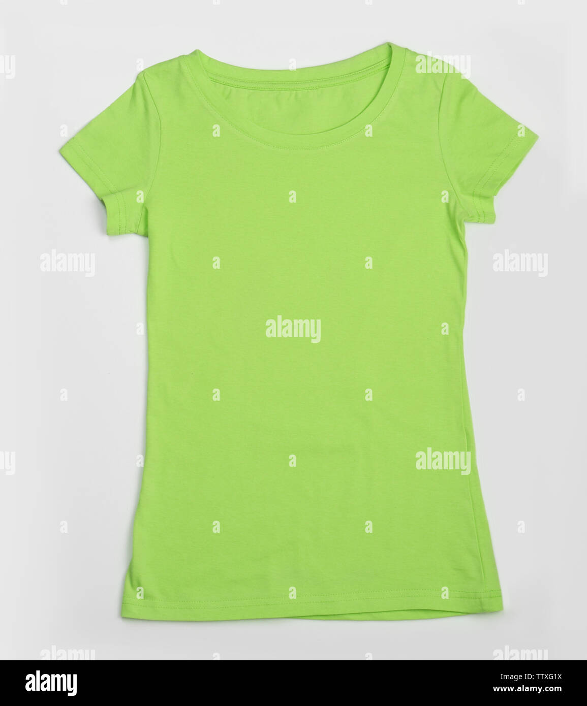 Blank color t-shirt on white background Stock Photo - Alamy
