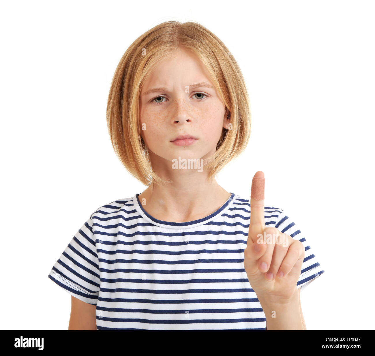 Girl showing finger with sticking-plaster, isolated on white Stock ...