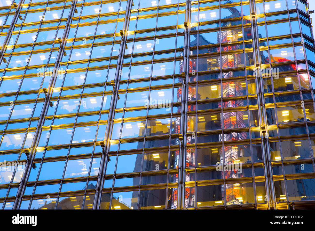 windows in a tall building at night Stock Photo - Alamy