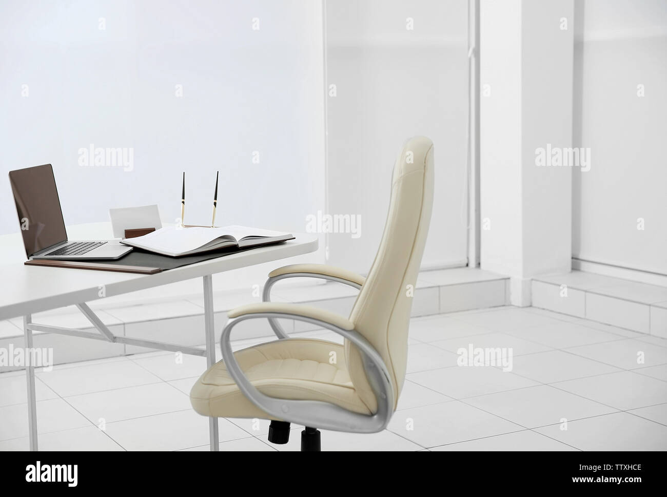 Empty office with executive workplace Stock Photo - Alamy