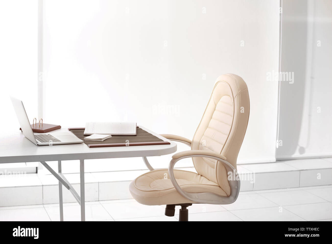 Empty office with executive workplace Stock Photo - Alamy