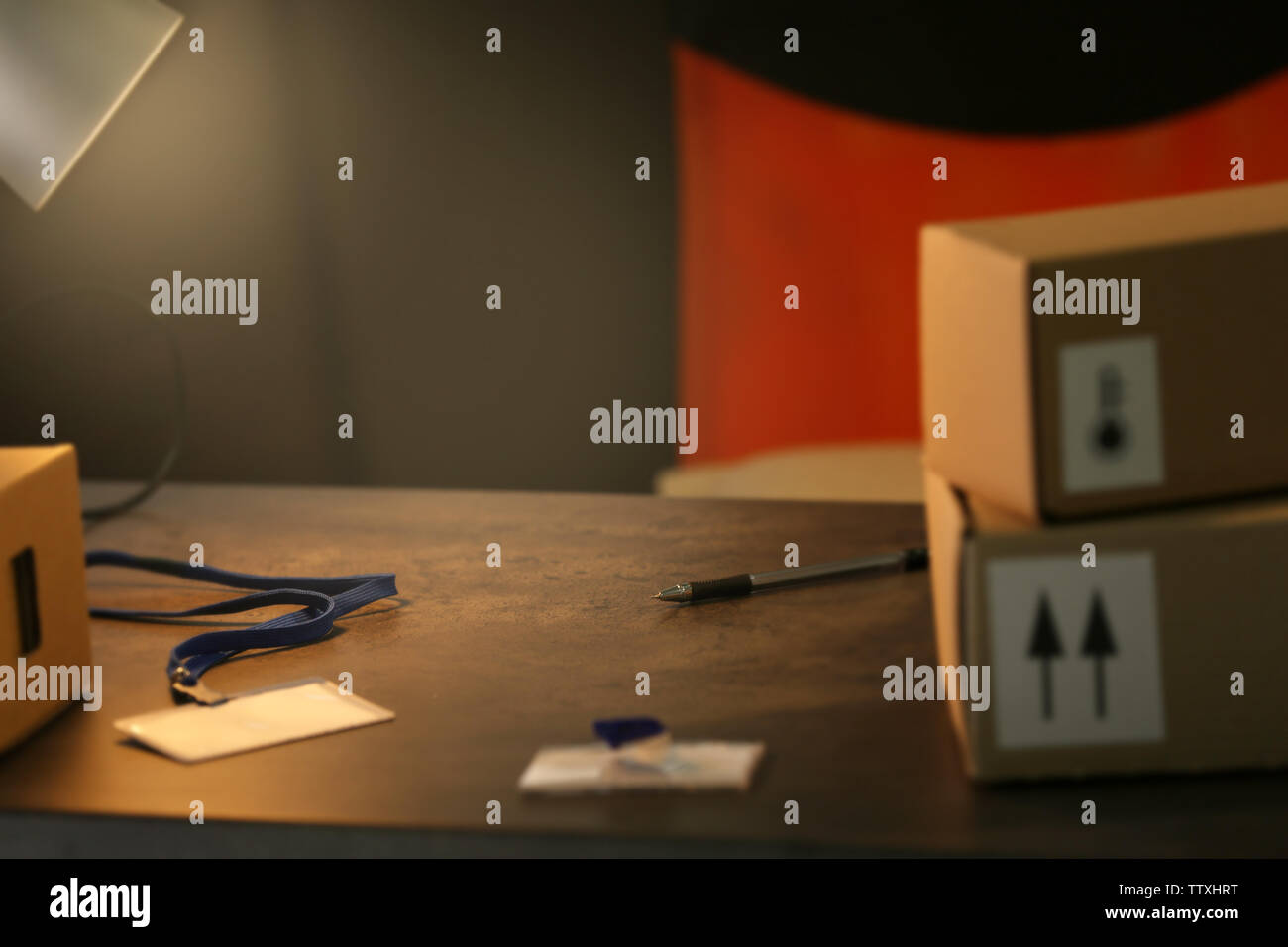 Carton boxes on table in room Stock Photo - Alamy