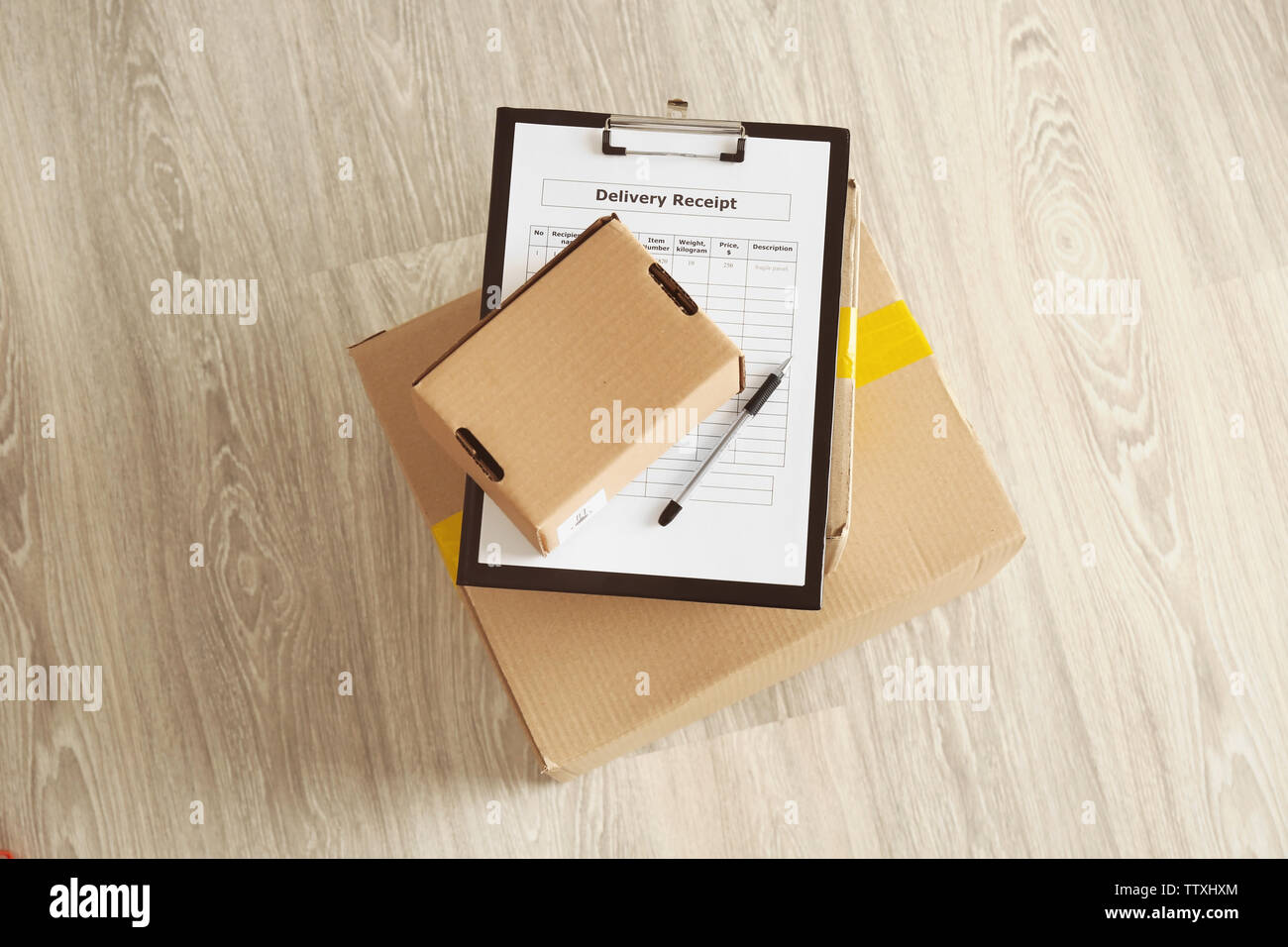 Carton boxes on floor Stock Photo - Alamy