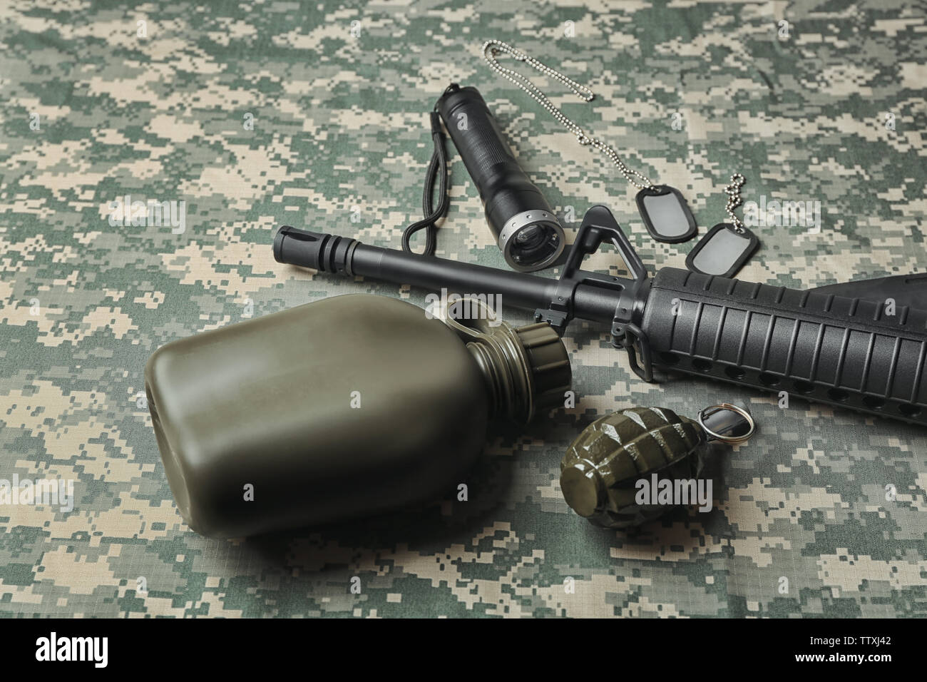 Military set on camouflage clothing Stock Photo - Alamy