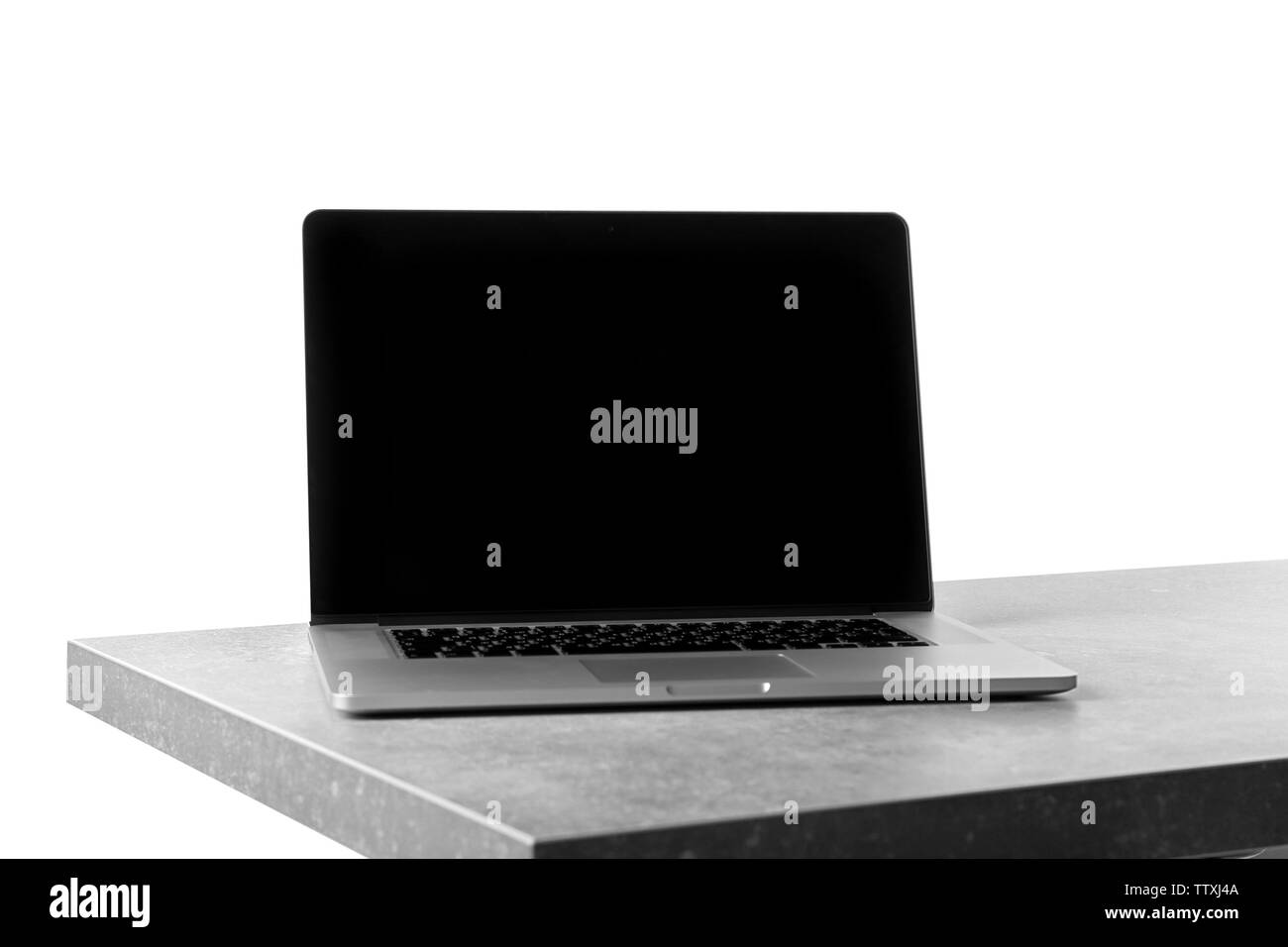 Modern laptop on table Stock Photo - Alamy