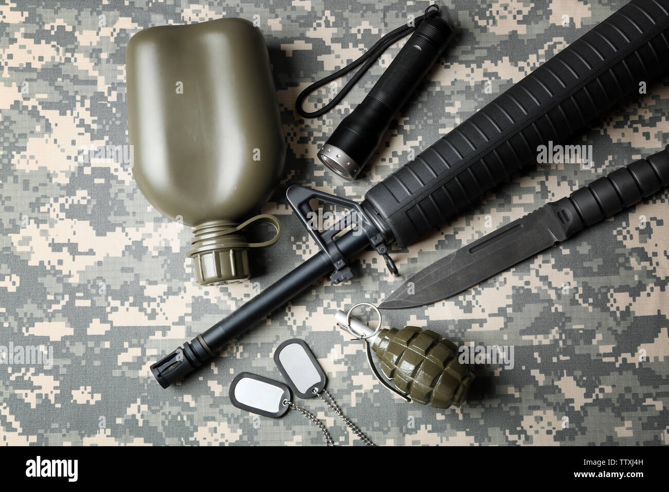 Military set on camouflage clothing Stock Photo - Alamy